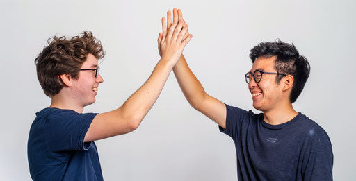 Two men high-fiving, isolated on white background – IMAGELLA