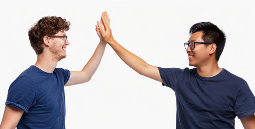 Two men high-fiving, one white and one Asian, on white background. 39: ...