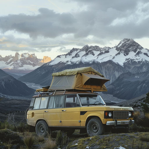 Range Rover expedition vehicle with rooftop tent and all-terrain gear ...